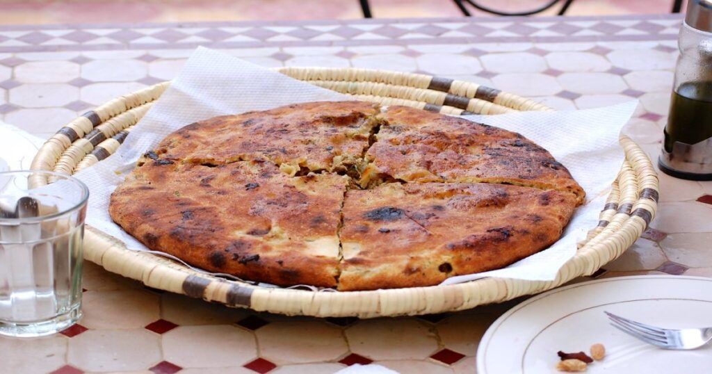Medfouna: The Berber Pizza Dish In The Desert Of Morocco